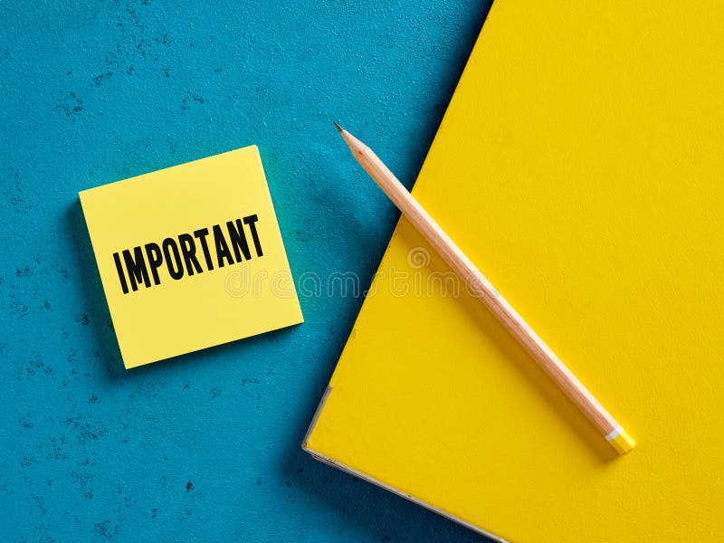 Important Message on Yellow Sticky Note Paper with a Pencil and Binder ...