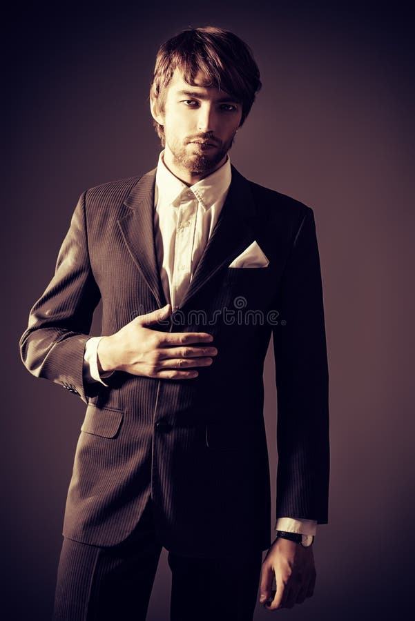Attractive and Elegant Man Posing with a Gun in His Trousers Stock ...