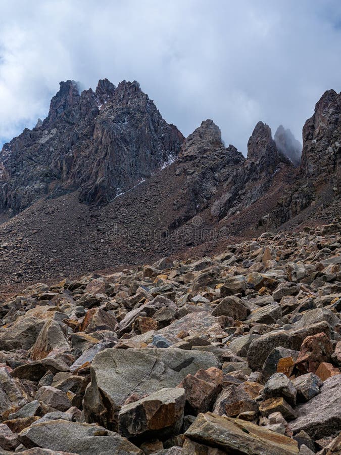 Impregnable Cliffs Peek Out of the Clouds Stock Photo - Image of ...