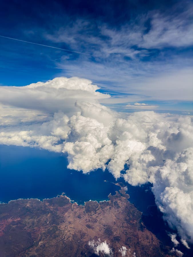 Impressive Clouds Can Be Seen in the Sky during the Flight Stock Image ...
