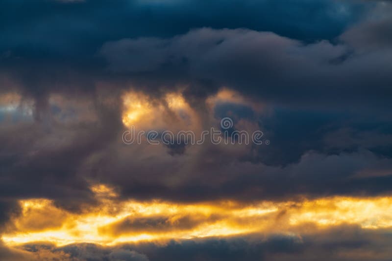 Impressive Clouds in Sky Illuminated by Rays of Sun at Sunset To Change ...