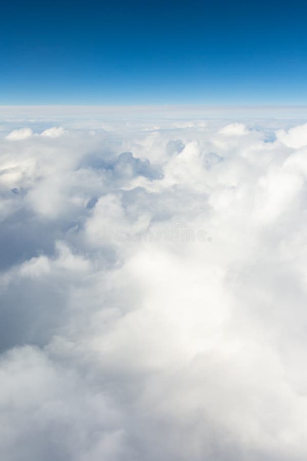 Impressive Cloudscape with White Clouds Beneath Stock Photo - Image of ...