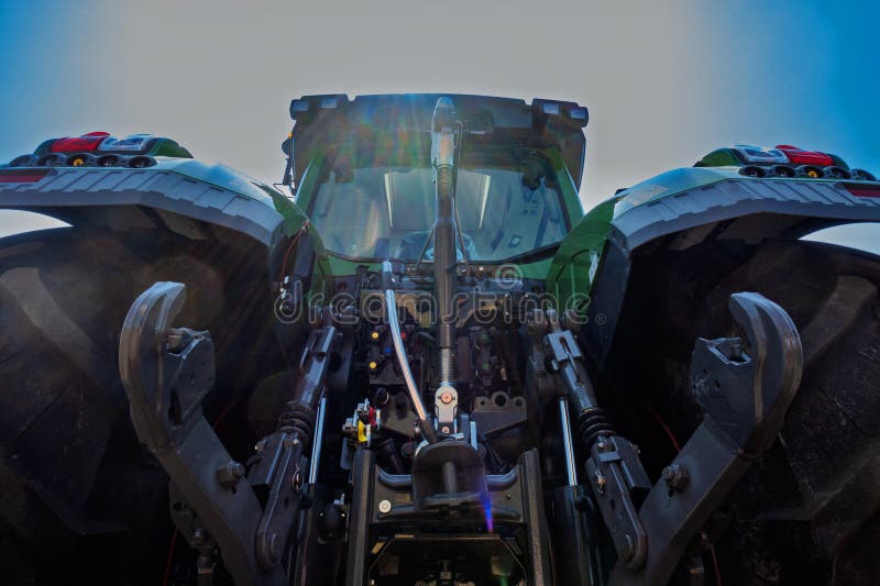 The Impressive Frontal View of a Modern Tractor with Powerful ...