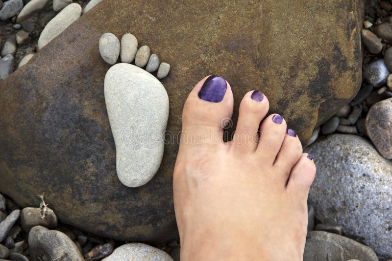 Imprint of a Human Foot from Stones Stock Photo - Image of footprint ...
