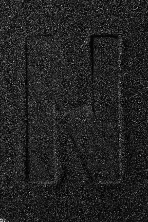 Imprint of a Letter Squeezed Out on Black Sand. Stock Image - Image of ...
