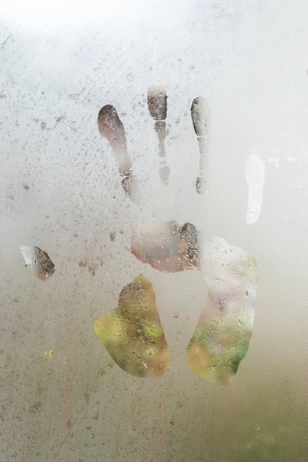 The Imprint of the Palm of Human Hand on Frozen Window Glass Stock ...
