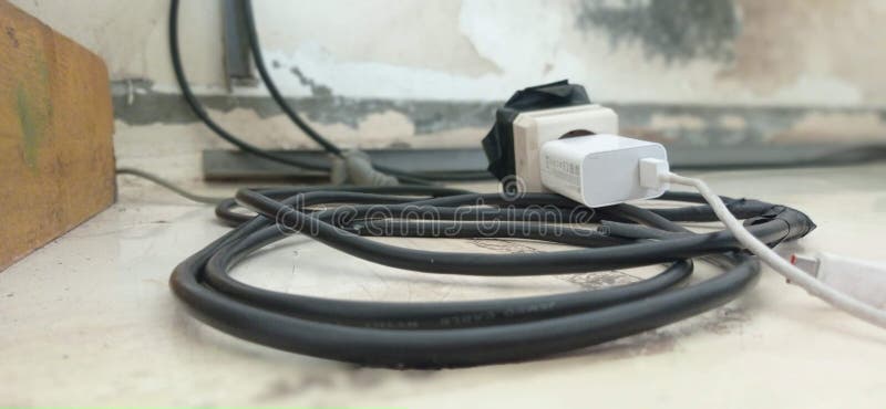 Dangerous Installation of Electricity Cables and Wires on the Wa ...