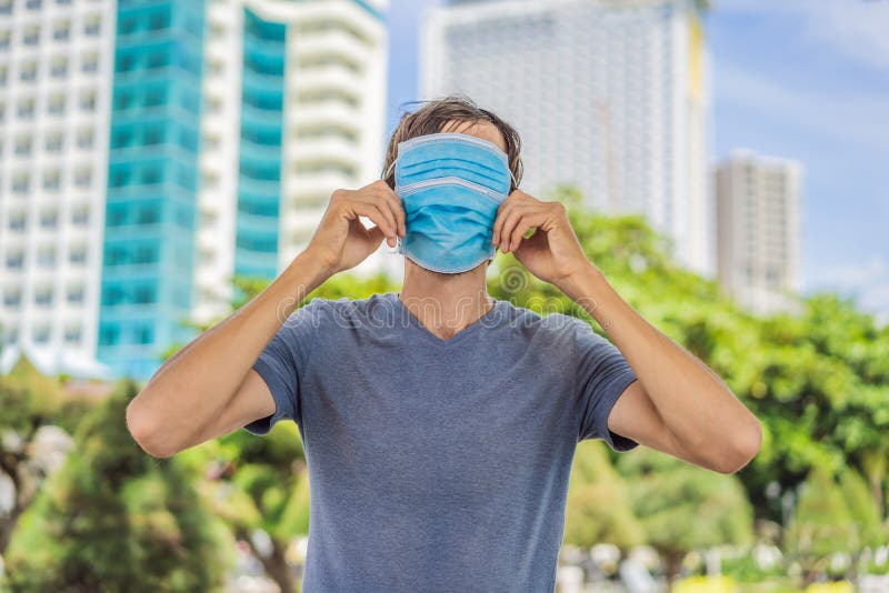 Improper Wearing of Mask Concept. Man Wants To Wear an Old, Crumpled ...