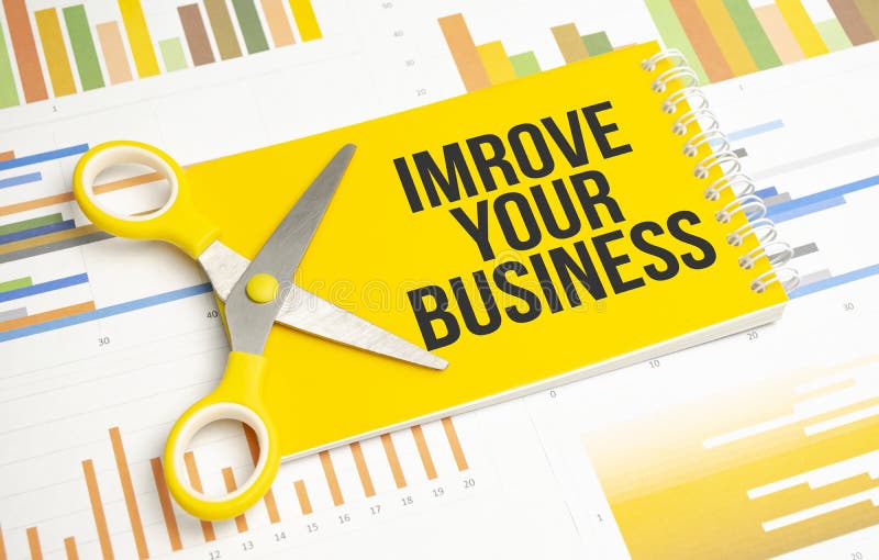 Improve Your Business Words on Yellow Sticker and Charts Stock Photo ...