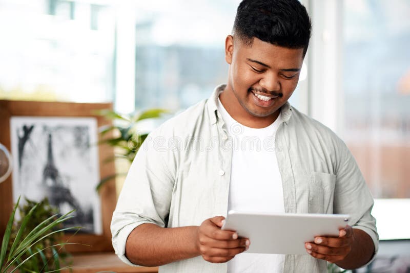 Improving His Workflow One App at a Time. a Young Businessman Using a ...