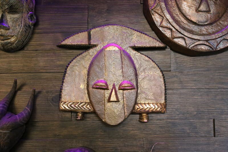 Inca Mask on the Wooden Wall Stock Image - Image of gold, wooden: 89053415