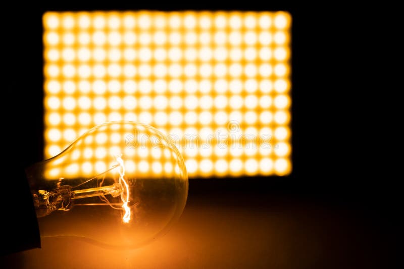 Incandescent Bulb in Front of a Led Panel Stock Photo - Image of ...