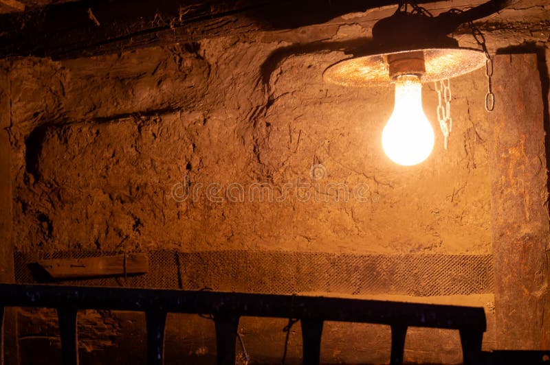 Incandescent Lamp in an Old House. Vintage Ceiling Lamp and Old Large ...