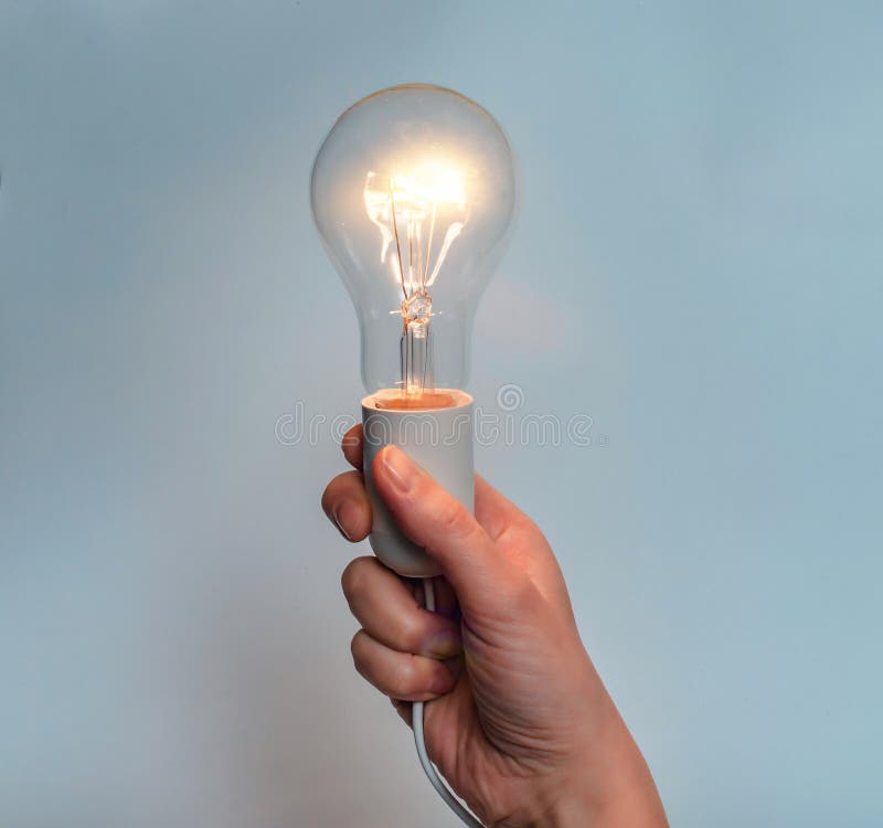 An Incandescent Lamp Shines in a Person S Hand Stock Image - Image of ...