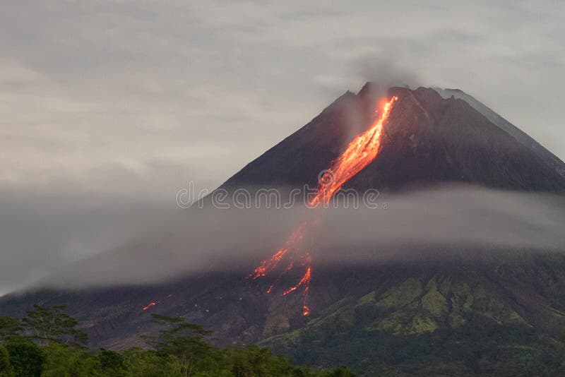 Active volcano again stock photo. Image of plain, alert - 273896540