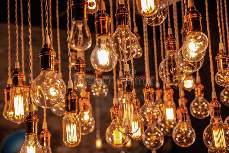 Hanging Array of Many Incandescent Light Bulbs Stock Image - Image of ...