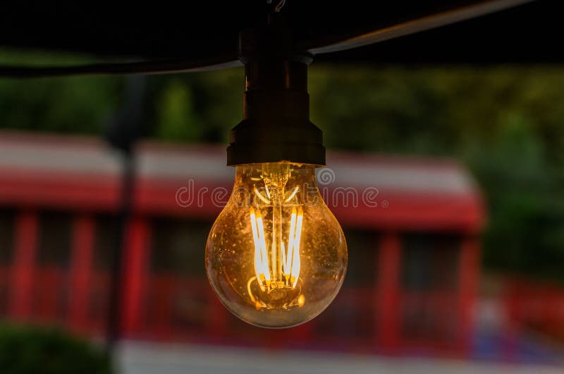 Incandescent Light Bulb Illuminates the Dark Stock Image - Image of ...