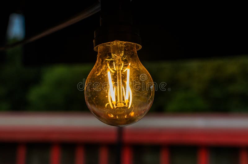 Incandescent Light Bulb Illuminates the Dark Stock Photo - Image of ...