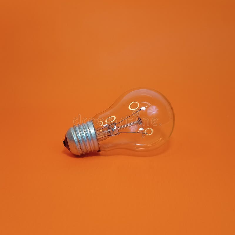 Incandescent Light Does Not Light Up, on an Orange Background. Stock ...