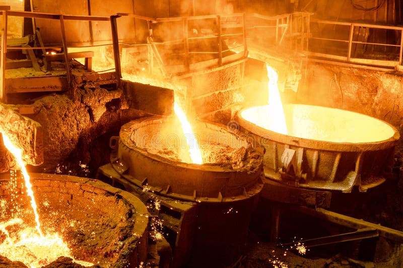 A Stream of Hot Metal, Molten Steel Flowing Along a Guide Chute. Stock ...