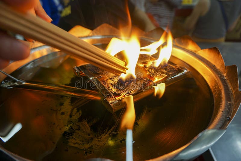 Incense is Being Lit by Fire. from a Large Lamp Stock Photo - Image of ...