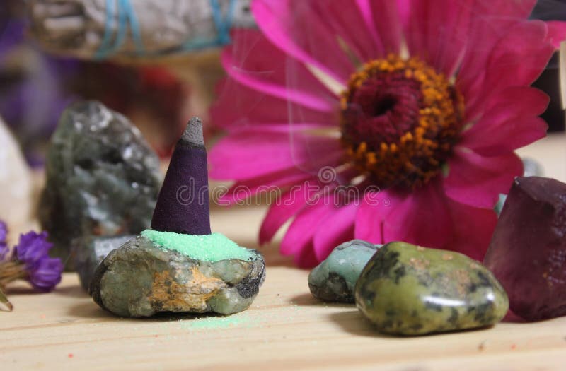 Incense Cone on Stone Slab with Crystals and Flowers Stock Image ...