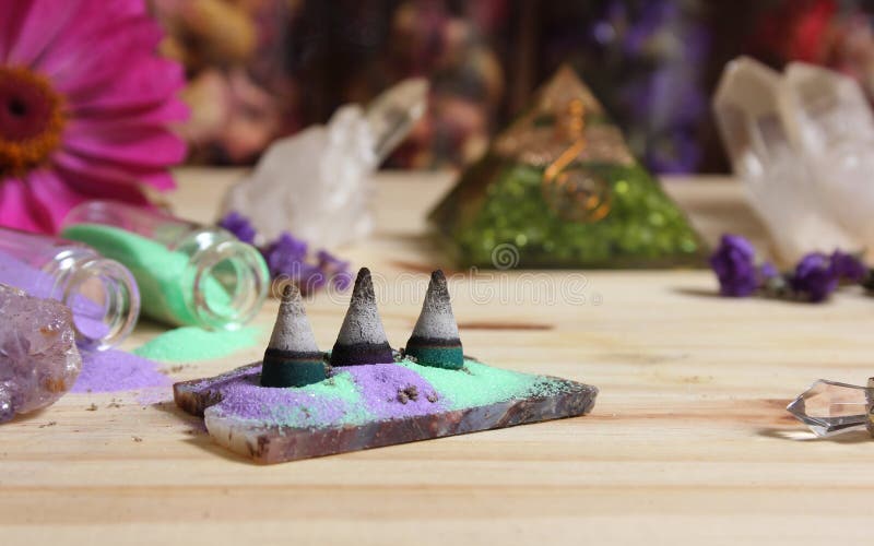Incense Cones on Stone Slab with Crystals and Flowers Stock Image ...