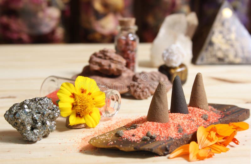 Incense Cones on Stone Slab with Crystals and Flowers Stock Photo ...