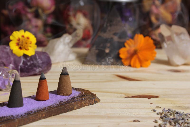 Incense Cones on Stone Slab with Crystals and Flowers Stock Image ...
