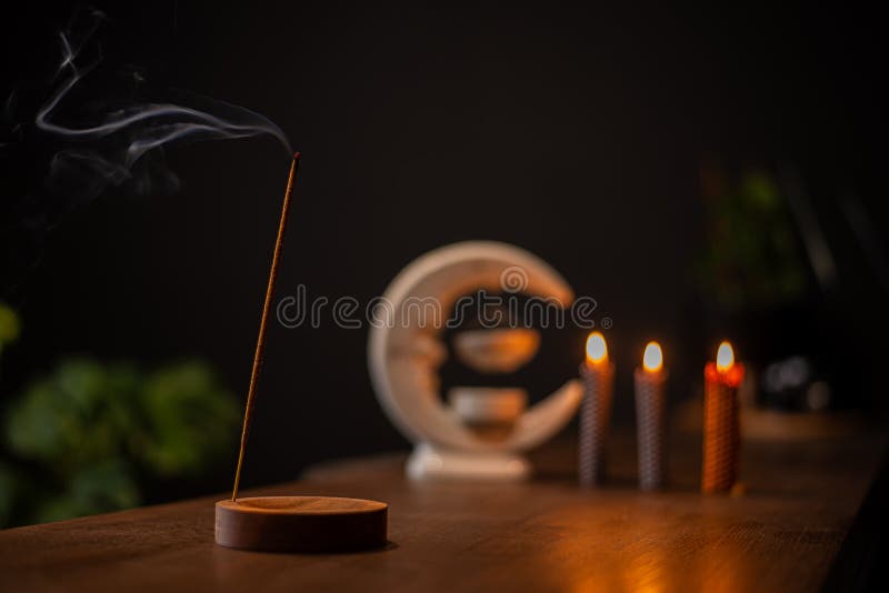An Incense Stick Burning and Generating Aromatic Smoke Surrounded by ...