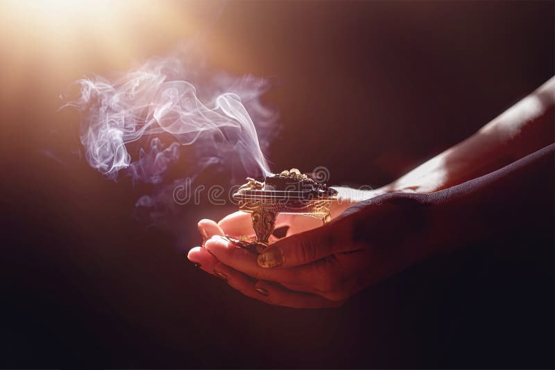 Incense in a Woman Hand, Incense Smoke on a Black Background. Stock ...