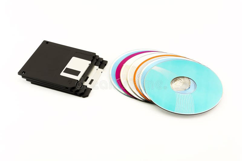 1.44 Inch Floppy Disks and CD / DVD Discs Lie on a White Background ...