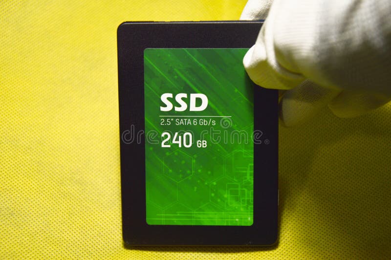 2.5 Inch SSD Hard Drive Laying on a Yellow Background Stock Photo ...