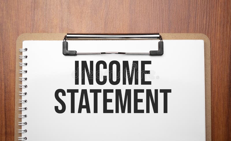 Income Statement Text on White Paper on the Wood Table Stock Photo ...