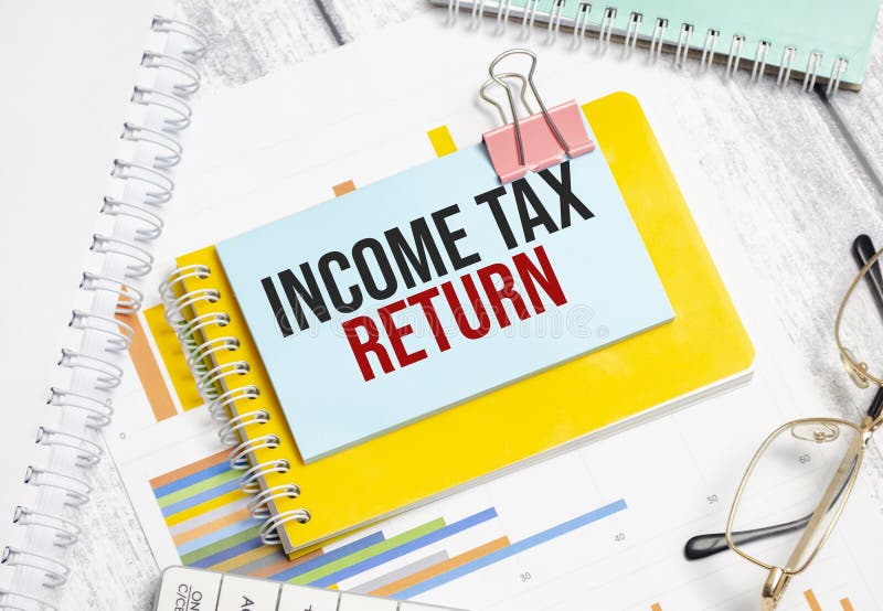 Income Tax Return Words on Blue Sticker with Glasses Stock Image ...