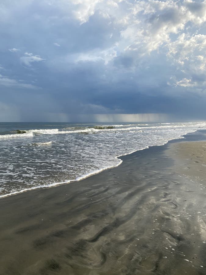 Incoming Storm on the Beach. Stock Photo - Image of tide, sand: 211206574
