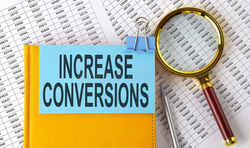INCREASE CONVERSIONS Text on Sticker on Notebook with Magnifier and ...