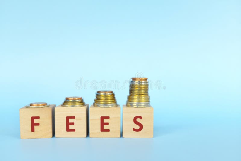 Increasing, Raising and High Fees Concept. Stack of Coins in Wooden ...