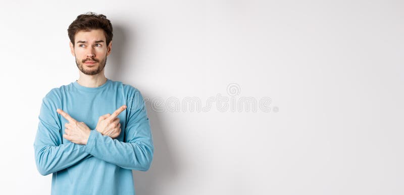 Indecisive Man Making Choice, Pointing Fingers Sideways at Two Variants ...