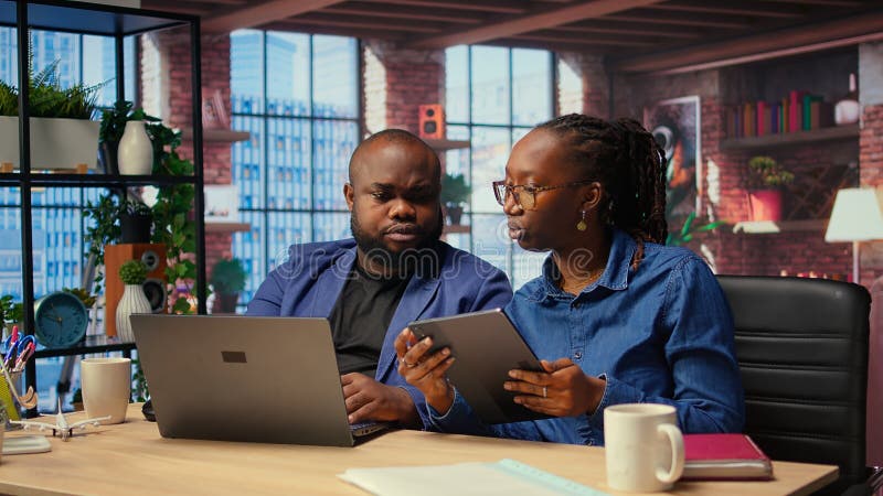 Independent People Using Devices for Their Remote Job Tasks Stock Photo ...