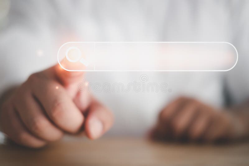 The Index Finger of a Male Hand Points To the Search Field on the ...