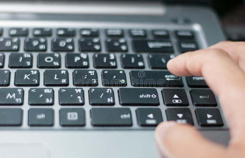 An Index Finger is about To Press on Enter Button of a Computer Stock ... An Index Finger is about To Press on Enter Button of a Computer Stock ...