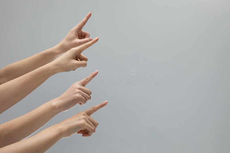 Index Fingers Pointing Up on a Grey Background. Stock Image - Image of ...