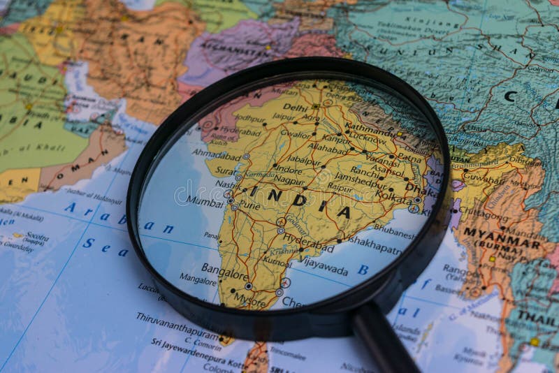 Map of China through Magnifying Glass on a World Map. Stock Photo ...
