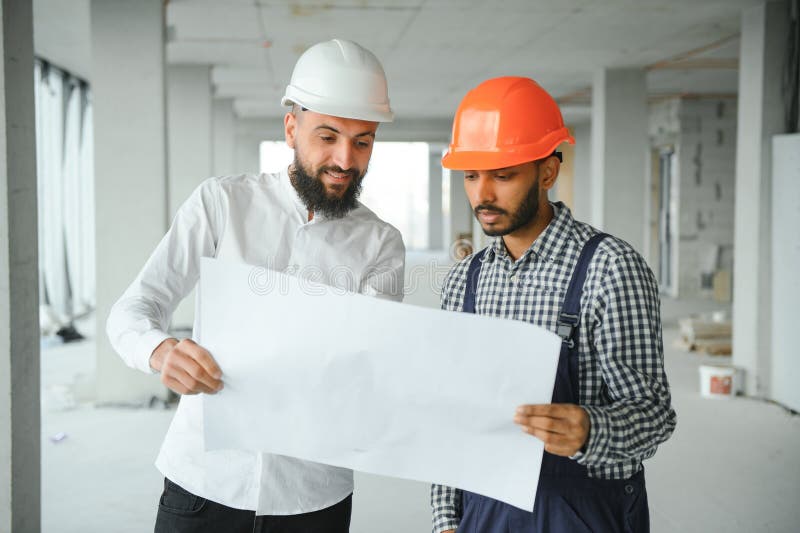 Indian and Arabian Engineers. Contractor and Architect Talking about Working on Big Project ...