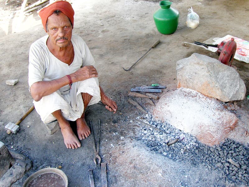 Indian Blacksmith Working on the Streets. Pictured in Ahmedabad India ...