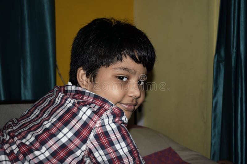 Indian boy turning back stock photo. Image of people - 201432768