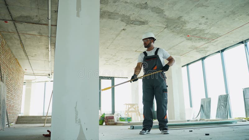 Indian Builder Worker Using Roller on Construction Site Walls Stock ...