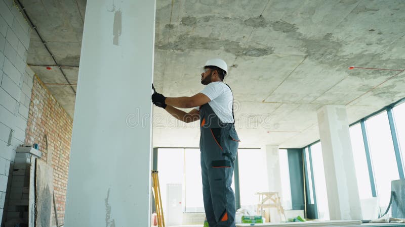 Indian Builder Painting Wall with Roller on Construction Site Stock ...