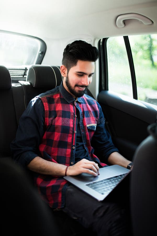 Indian Business Male Using Laptop Inside the Car on Back Seat Stock ...